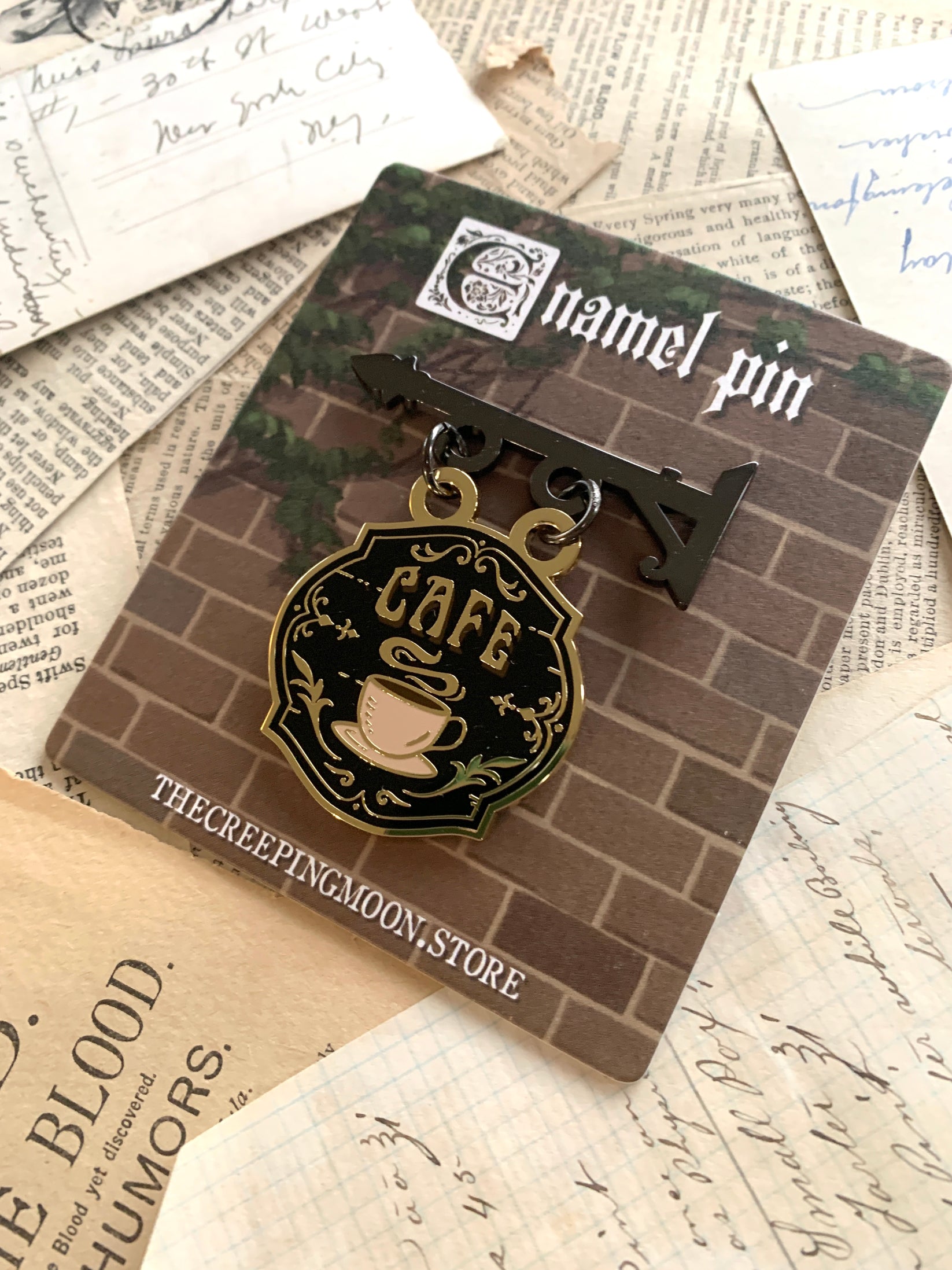 Cafe shop sign enamel pin – The Creeping Moon